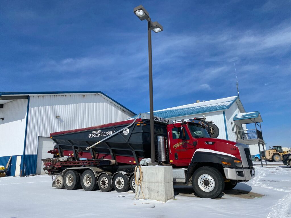 CAT Stone Slinger - Treasure State Concrete